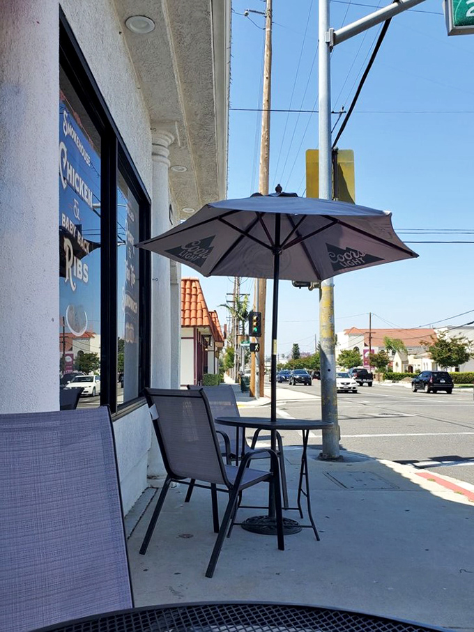 Sometimes you need fresh air to recover from a BBQ feast. The simple outdoor seating area provides a moment of reflection on the deliciousness you've just experienced.