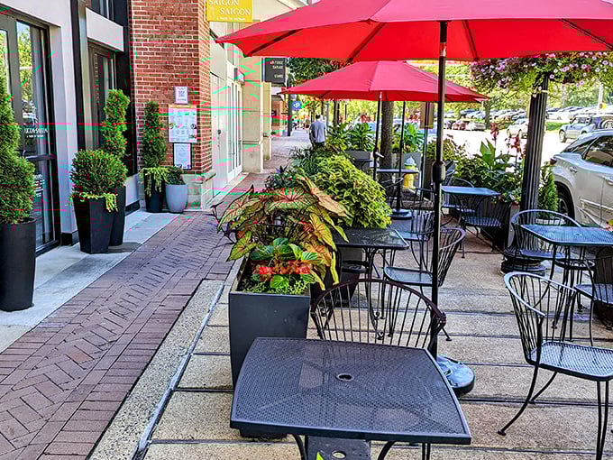 The outdoor seating area offers an urban oasis under bright red umbrellas&mdash;perfect for people-watching while savoring your Vietnamese feast.