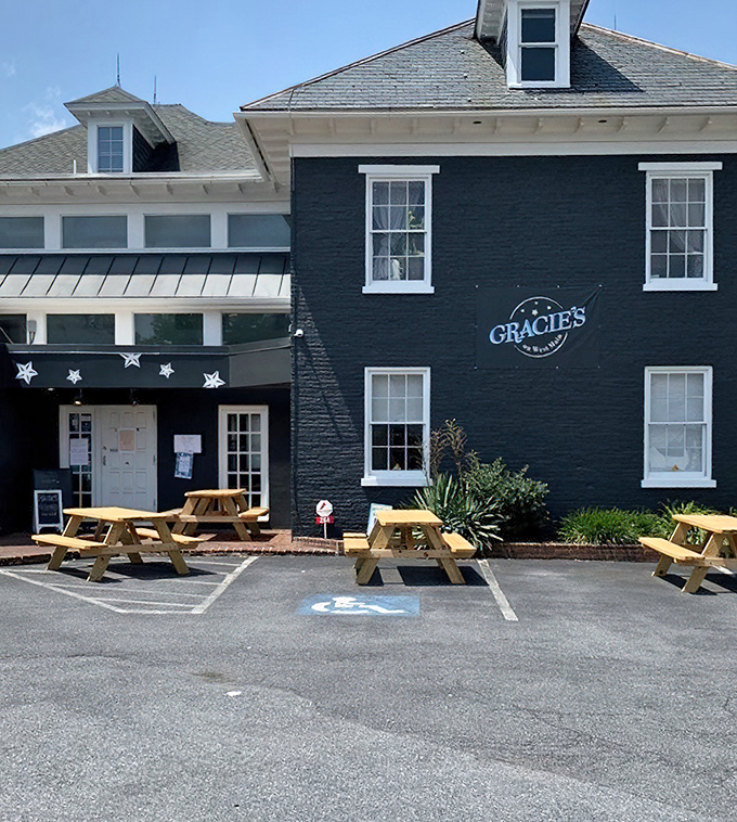 Outdoor picnic tables invite alfresco dining with a side of people-watching &ndash; Pennsylvania summer perfection in wooden form.