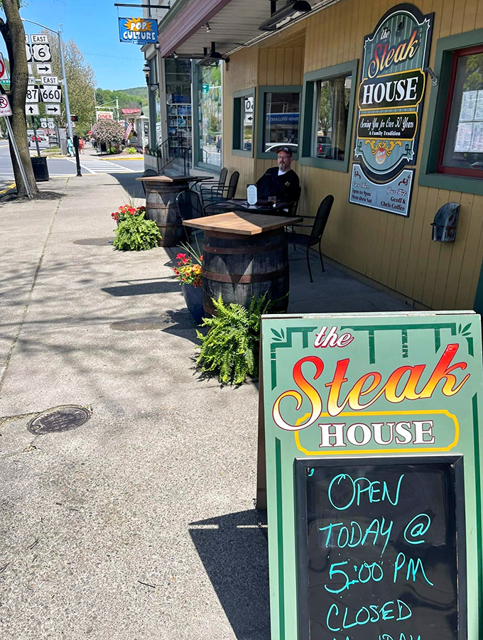 Sidewalk dining with barrel tables and potted plants&mdash;because sometimes the best appetizer is a dose of small-town charm.
