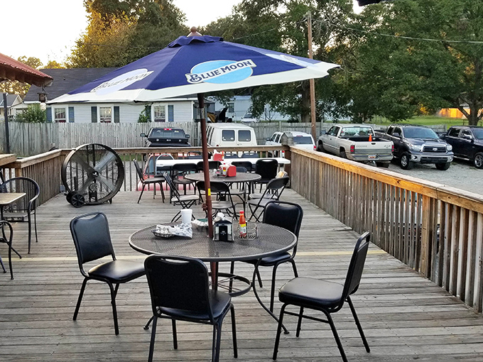 The outdoor deck offers fresh air with your burger, because sometimes you need space to contemplate the delicious decision you just made.