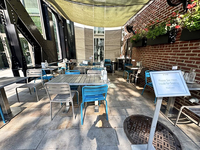 The outdoor seating area offers urban tranquility &ndash; blue chairs against brick walls where you can savor your Jerusalem bagel while watching Philadelphia stroll by.
