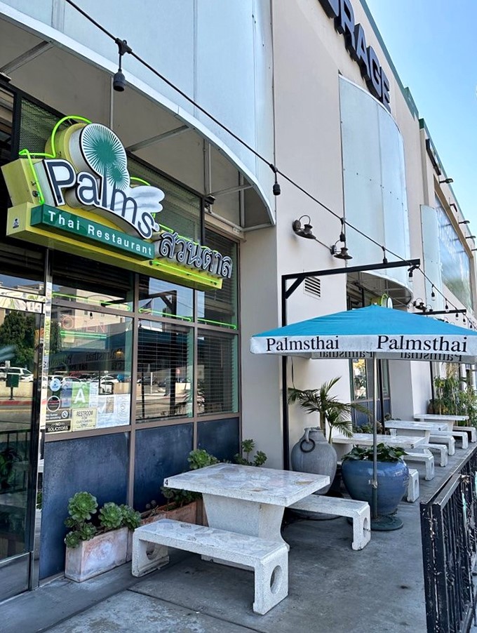 The outdoor seating area says, "Come, sit, stay awhile." Those concrete benches have supported countless diners waddling out after one too many egg rolls.