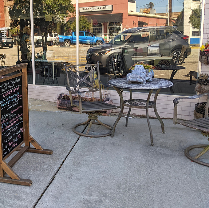 Outdoor seating with a chalkboard menu &ndash; where locals linger over coffee and visitors get their first taste of Burgaw's unhurried charm.