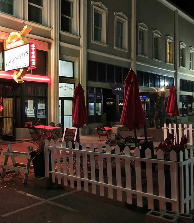 The outdoor seating area, with its white picket fence, offers al fresco dining under the stars of the Oregon sky.