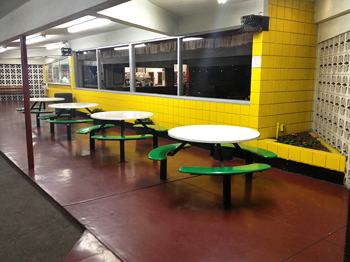 These aren't just tables &ndash; they're community gathering spots where strangers become neighbors over shared ketchup bottles.