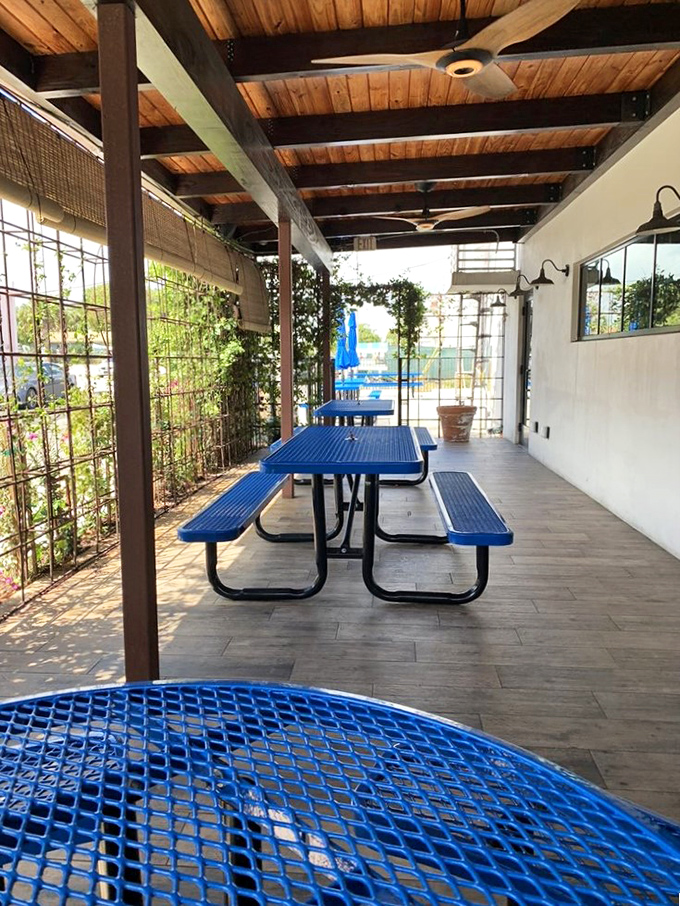 The outdoor seating area offers a breezy Florida respite&mdash;because sometimes you need fresh air to contemplate how good that brisket was.