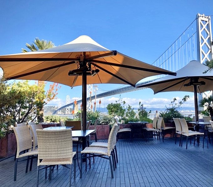 The outdoor patio where the Bay Bridge isn't just a view &ndash; it's practically part of the table setting, making even tourists feel like locals.