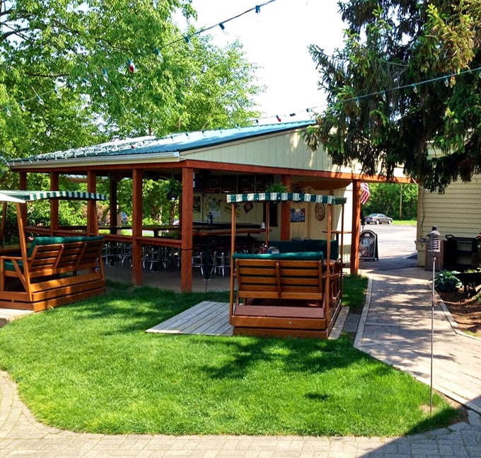Outdoor seating that makes Michigan summers feel eternal. These swinging chairs practically demand you order another round.