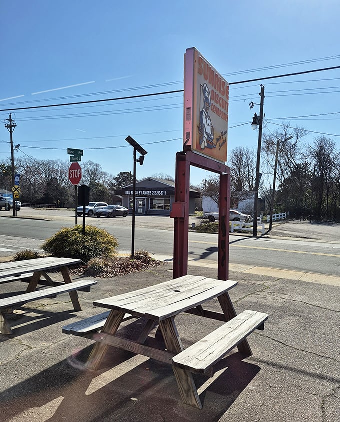 Outdoor seating for those who can't wait to get home before diving into their biscuit treasures. The picnic table has seen things.