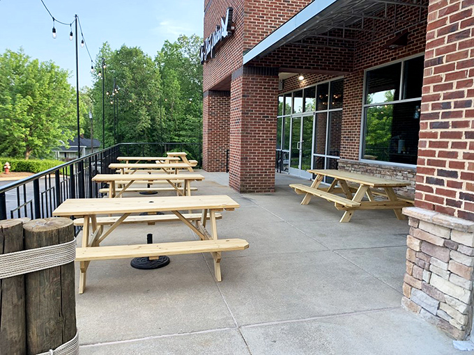 The outdoor patio &ndash; where fresh air enhances fresh seafood. These picnic tables have witnessed countless "mmms" and "you've got to try this."