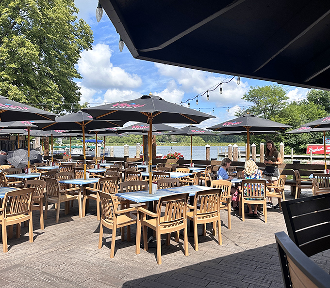 Lake Minnetonka provides the backdrop for this outdoor dining paradise, where every table feels like the best seat in the house.