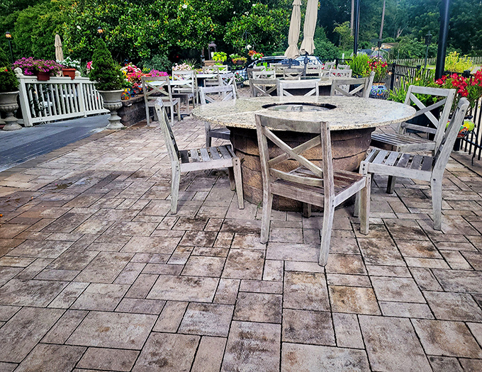 Fire pits and weathered chairs create the perfect outdoor gathering spot—where dessert and digestifs under the stars become tradition.