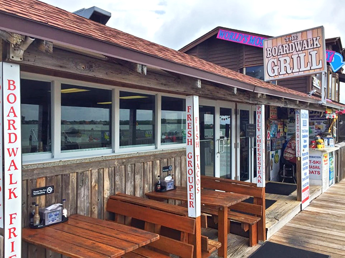 Rustic outdoor seating where countless happy meals have occurred. These wooden benches have heard more "mmms" and "ahhs" than a massage therapist.