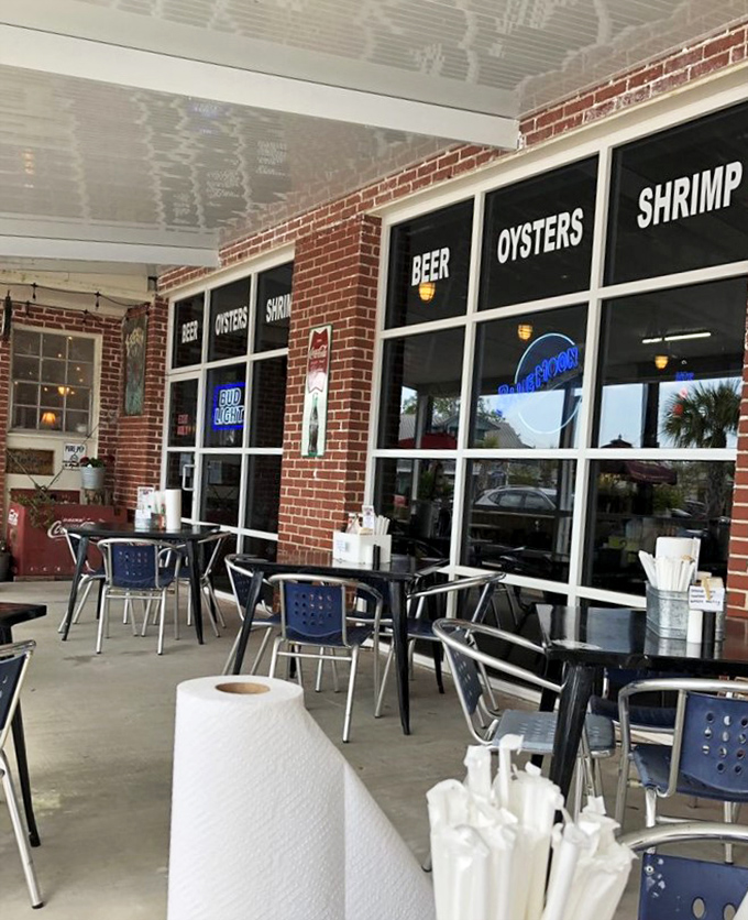 The storefront announces its priorities with admirable clarity: BEER, OYSTERS, SHRIMP. Sometimes the simplest advertising is the most effective.