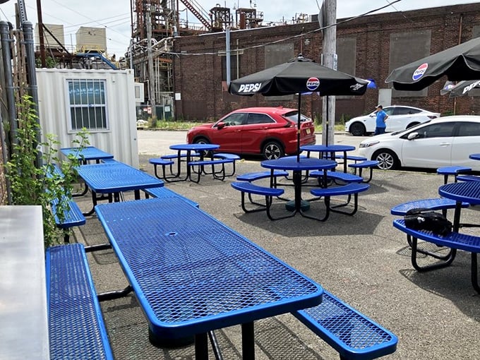 The outdoor seating area—where sandwich dreams are consumed under Philly skies. Industrial backdrop included at no extra charge.