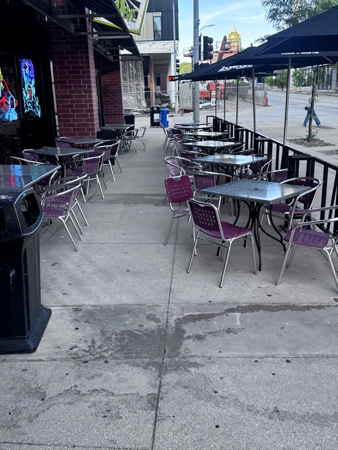 Outdoor seating for those brave souls who prefer fresh air with their undead-themed dining. People-watching with a side of fries.