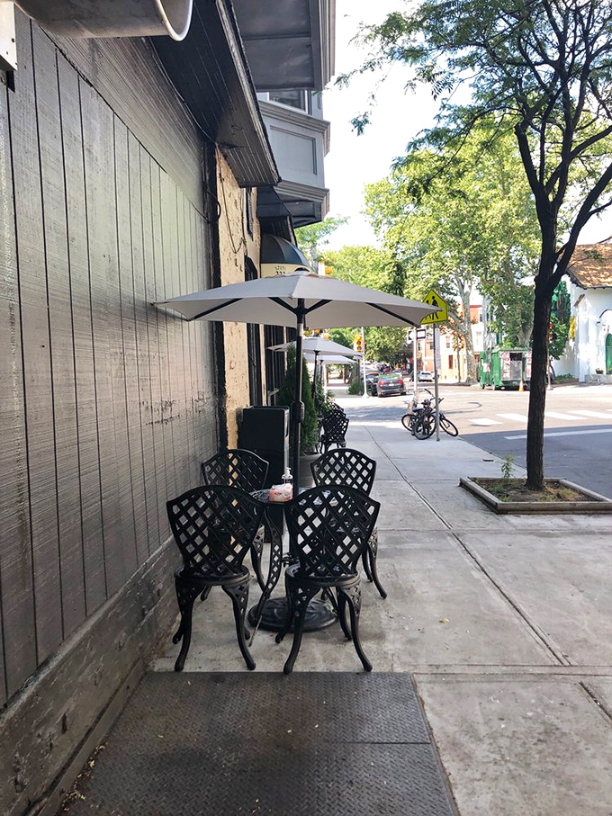 Sidewalk seating offers front-row seats to West Philadelphia street life, with a side of people-watching.