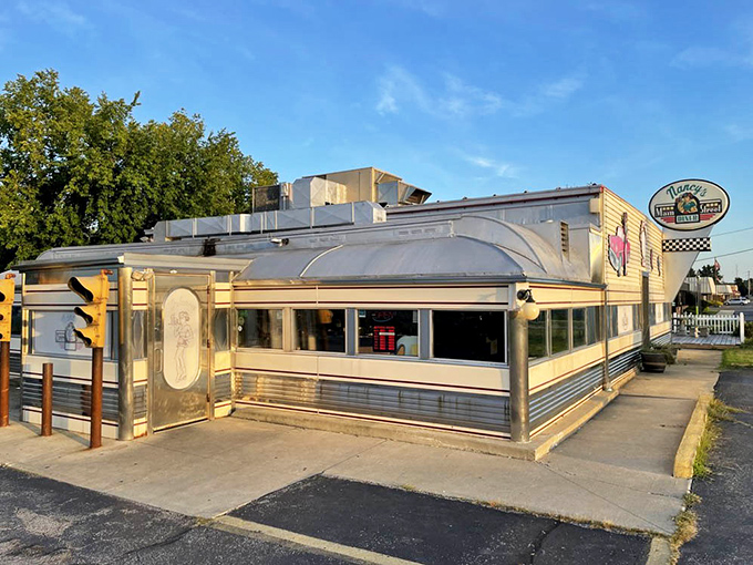 The classic diner architecture &ndash; gleaming stainless steel and large windows &ndash; stands as a monument to American dining culture that refuses to be replaced.