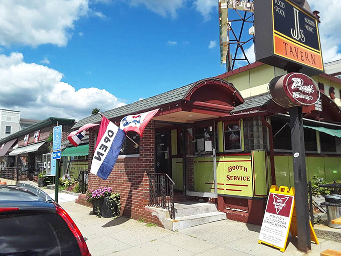The welcoming entrance with its "OPEN" flag fluttering in the breeze &ndash; a simple invitation to one of Massachusetts' most cherished culinary institutions.