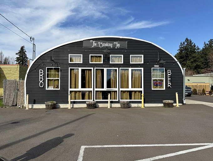 Morning sunshine highlights the distinctive curved architecture that houses some of Oregon's finest barbecue. A landmark worth the journey.