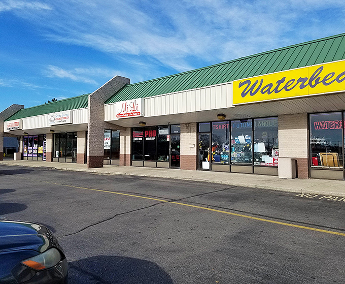 The full exterior view shows Mi Li's place in this Columbus strip mall. Like finding a rare book in a familiar library&mdash;unassuming but extraordinary.