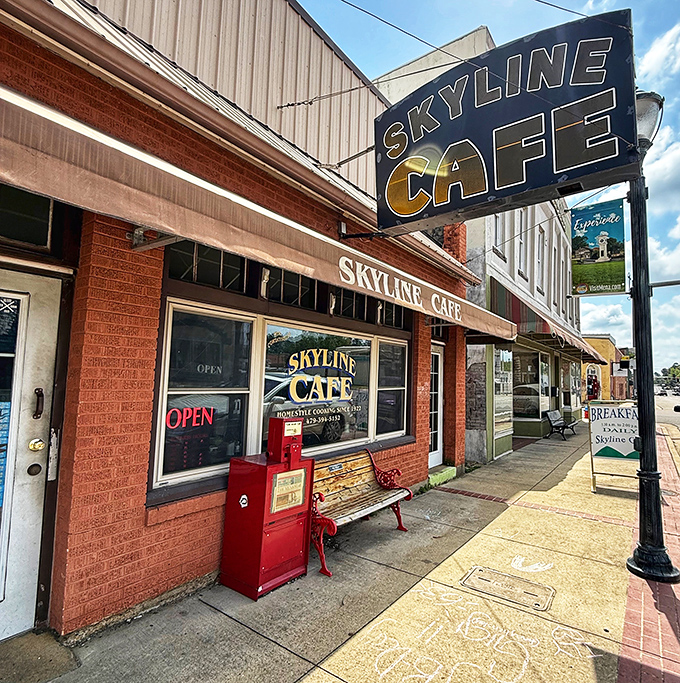 That red bench outside isn't just seating &ndash; it's a front-row ticket to small-town Arkansas life, with the best pre-meal show in town.