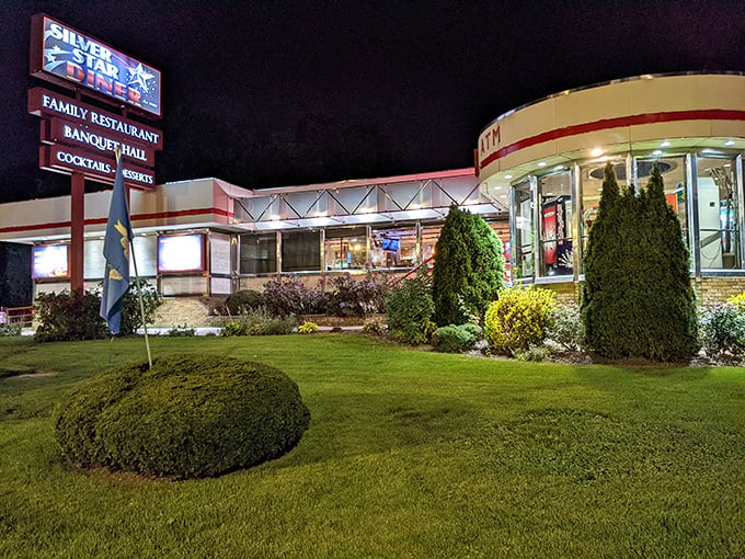As night falls, the Silver Star glows like a time machine promising comfort food from an era when calories were just numbers, not enemies.