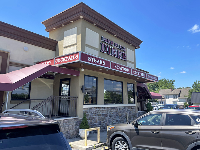 Morning sunshine highlights the Park Place Diner's welcoming facade &ndash; a temple of comfort food standing ready to rescue you from hunger's clutches.