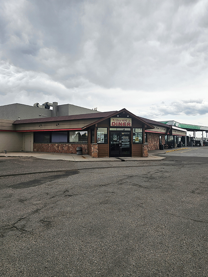 Even under moody skies, Down Home Diner promises warmth inside. Like a breakfast lighthouse guiding hungry souls to safety.