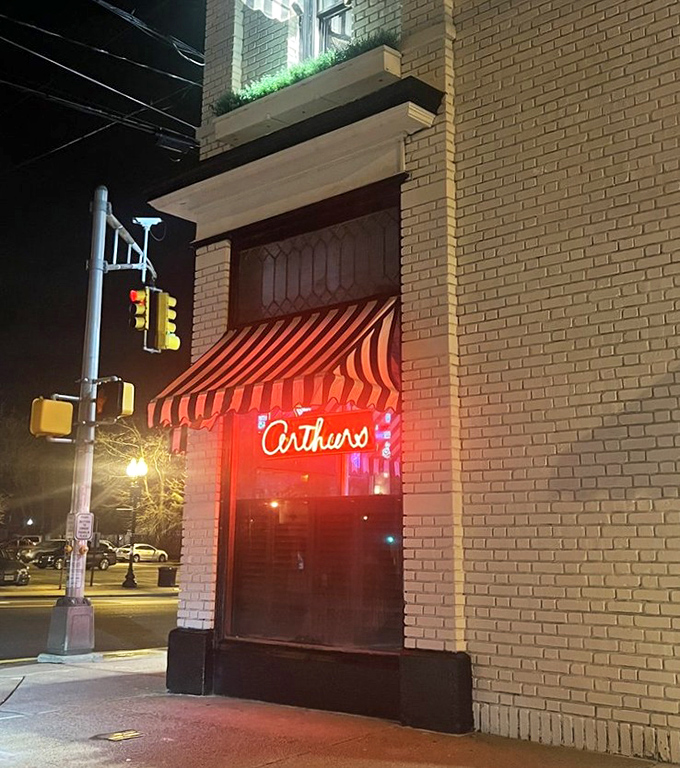 At night, that red neon "Arthur's" sign cuts through the darkness, a siren call to those seeking serious steak satisfaction in Morris Plains.