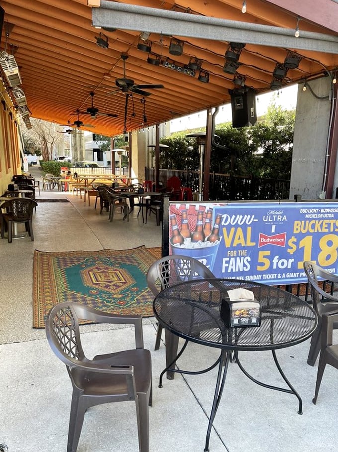 The covered patio offers fresh air, comfortable seating, and the perfect excuse to enjoy another round of that amazing food.