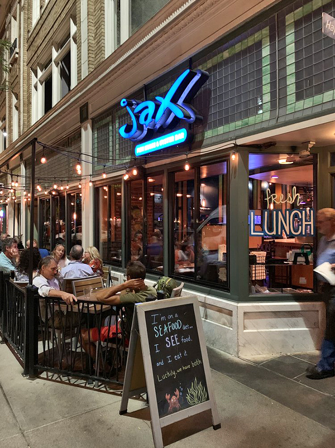 The outdoor patio offers prime people-watching with your prawns, where the sign reminds us all: "I'm on a seafood diet... I see food and I eat it."