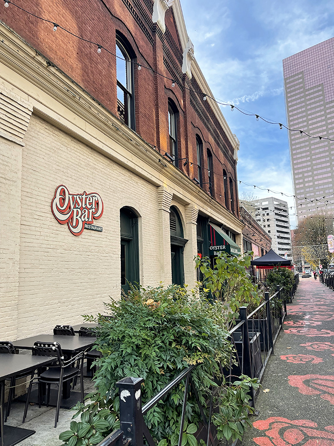 The contrast of historic brick against Portland's modern skyline reminds you that some traditions—like perfectly prepared seafood—never go out of style.