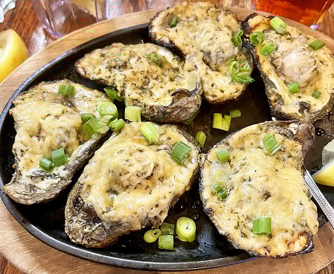 These aren't just stuffed mushrooms&mdash;they're little boats of joy sailing on a sea of butter, topped with melted cheese and green onions.