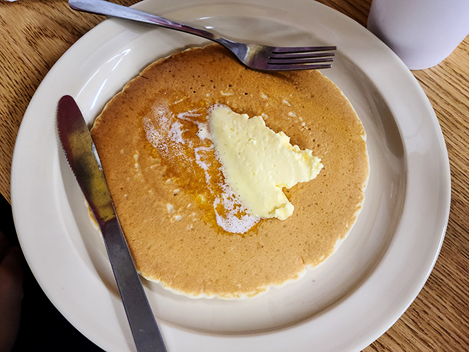 A perfect pancake with melting butter—the simple pleasure that reminds you why classics become classics in the first place.