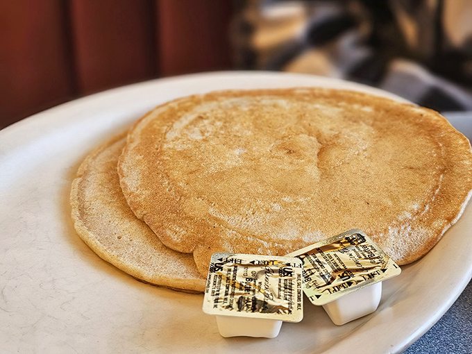 Pancakes so perfectly golden they deserve their own Instagram account&mdash;the butter melting into those fluffy ridges tells the whole story.