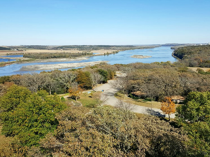 Autumn's paintbrush transforms the landscape into a masterpiece of golden and russet hues, best viewed from the park's highest points.