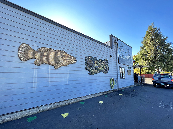 Fish sculptures adorn the exterior walls&mdash;a playful preview of the ocean treasures waiting inside this Eugene institution.