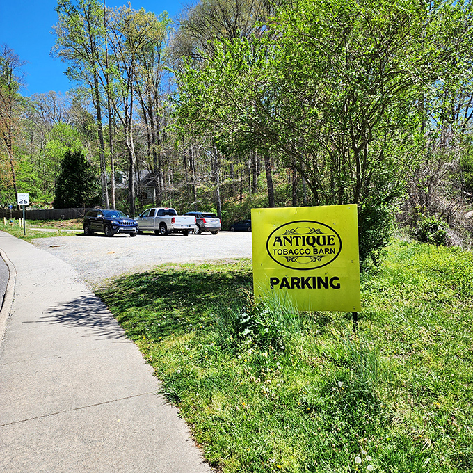 Even the parking sign has vintage charm. The bright yellow beacon guides antique enthusiasts to their happy place among Asheville's green landscape.
