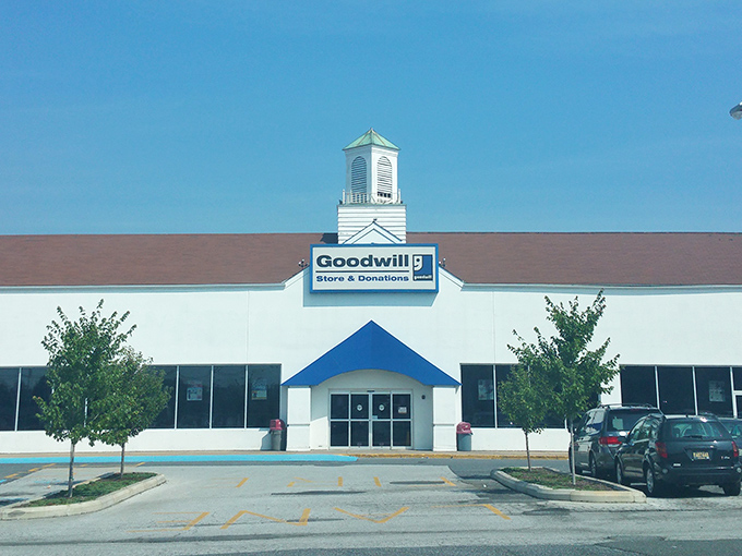 The stately Goodwill exterior with its distinctive cupola stands like a community landmark, promising sustainable shopping adventures for Delaware bargain hunters of all ages.