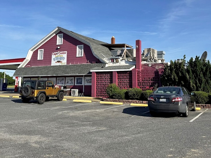 The parking lot view that promises salvation from hunger. That red barn means you've made at least one good decision today.