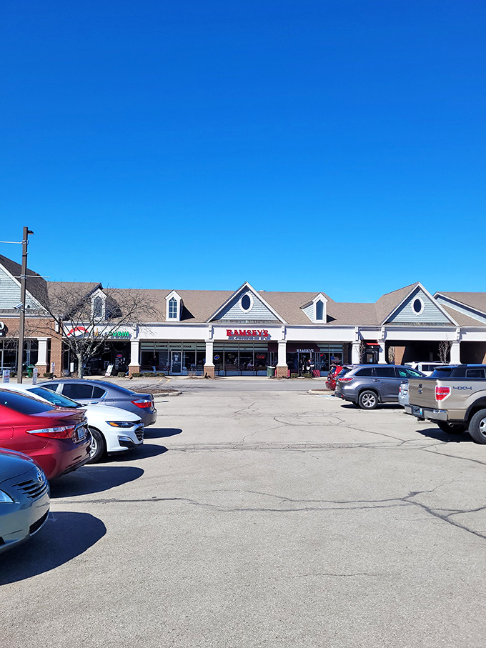 Under Kentucky's famous blue skies, Ramsey's stands ready to welcome hungry visitors. The full parking lot tells you everything you need to know about what awaits inside.