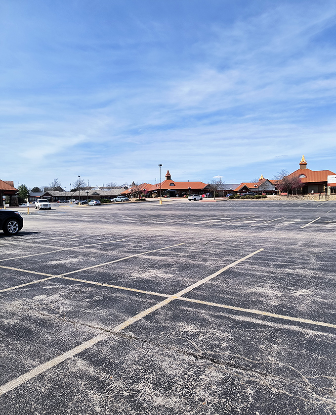The expansive parking lot stretches before copper-roofed buildings, promising ample space for the treasures you'll inevitably discover inside.