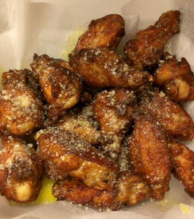 Parmesan garlic wings that don't need a fancy introduction&mdash;they let their golden, crispy, cheese-dusted perfection do all the talking.