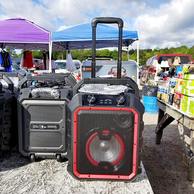 Portable party speakers with booming bass stand ready to provide the soundtrack for backyard barbecues and impromptu dance parties.