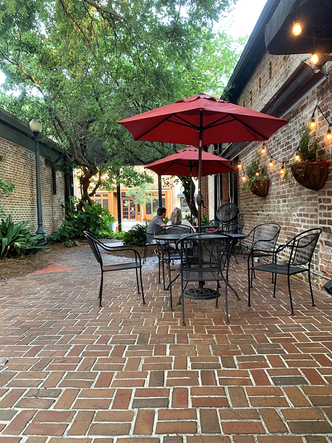 The charming brick patio where sweet tea tastes sweeter and conversations flow as easily as the Georgia breeze through the shade trees.