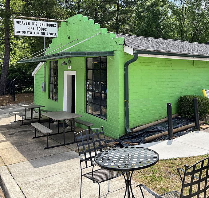 The outdoor seating area where summer breezes complement comfort food – a little slice of Athens paradise painted the color of optimism.