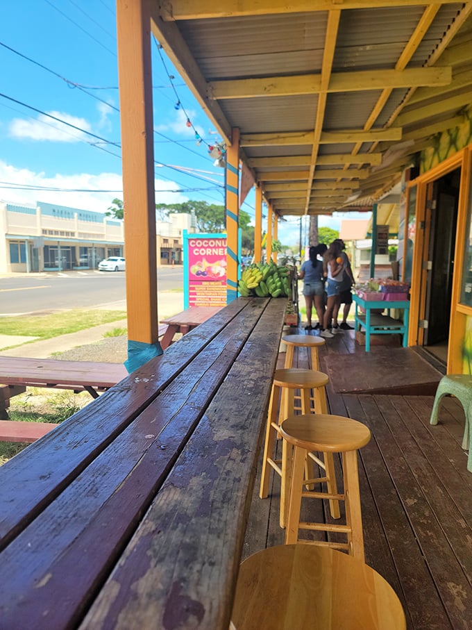 Wooden benches worn smooth by thousands of happy diners &ndash; the best seats in the house for a front-row view of paradise.
