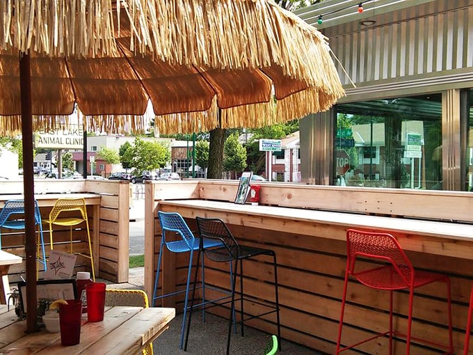 The patio brings tiki vibes to the Midwest with its straw umbrella and colorful seating. Summer in Minnesota never tasted so good.